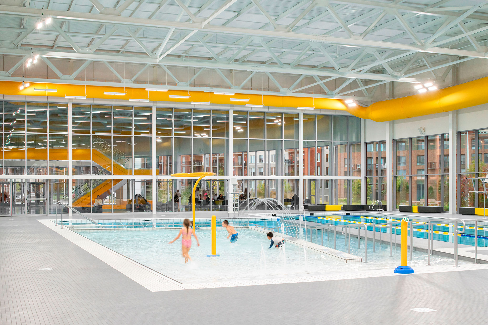 Vanguard and colour. Laval’s Aquatic Complex by Sid Lee Architecture ...