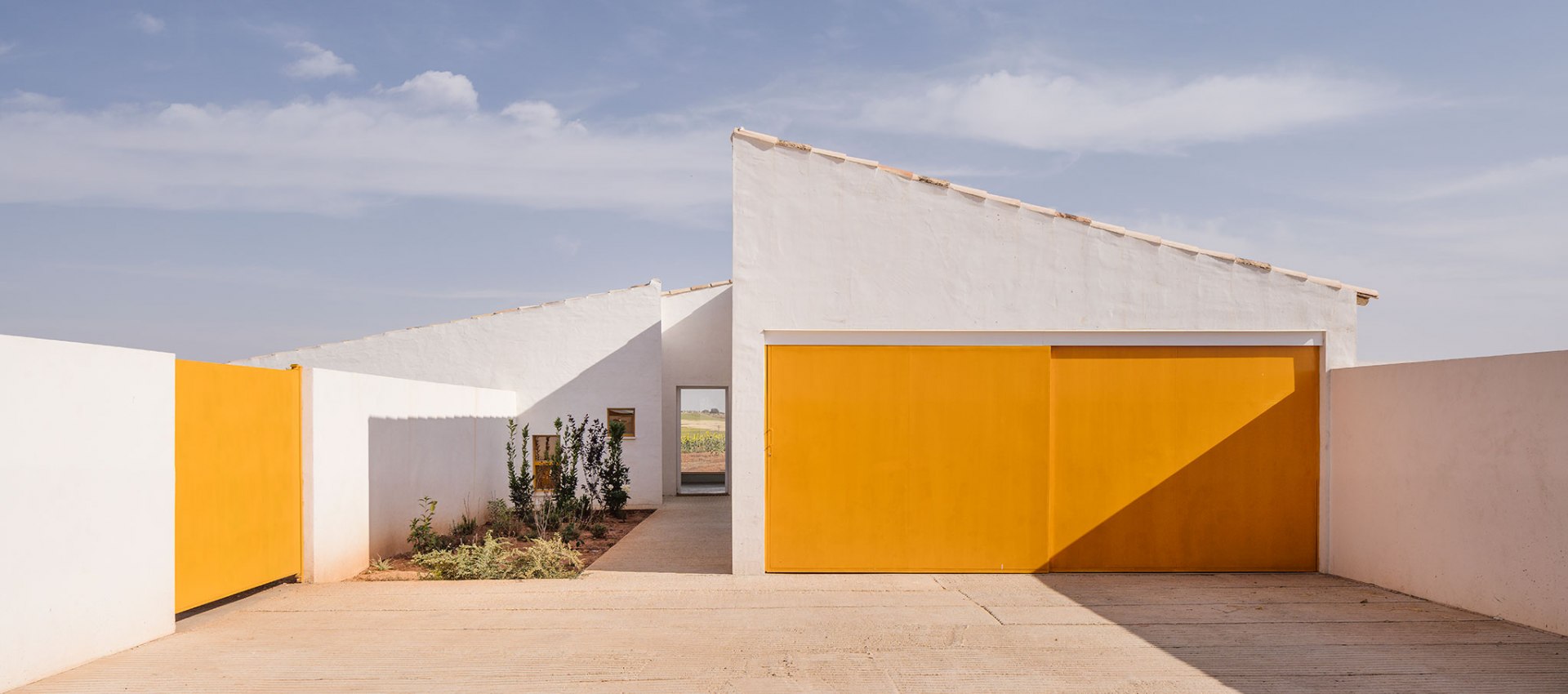 A house surrounded by agriculture. Cottage by Canobardin and Rosa Cano Cortés | The Strength of ...