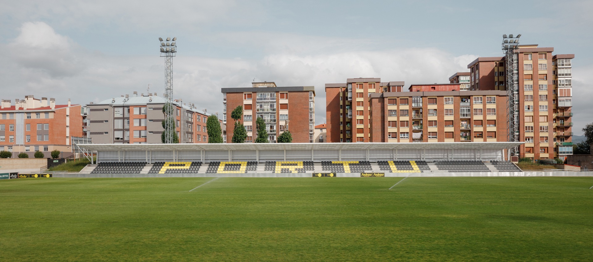 Protected football bleachers. Grandstand in La Florida soccer pitch in ...