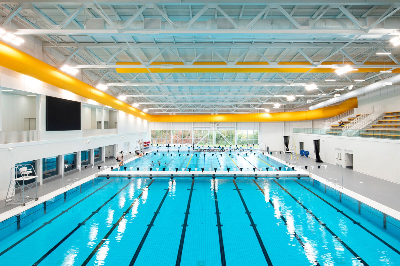 Vanguard and colour. Laval’s Aquatic Complex by Sid Lee Architecture ...