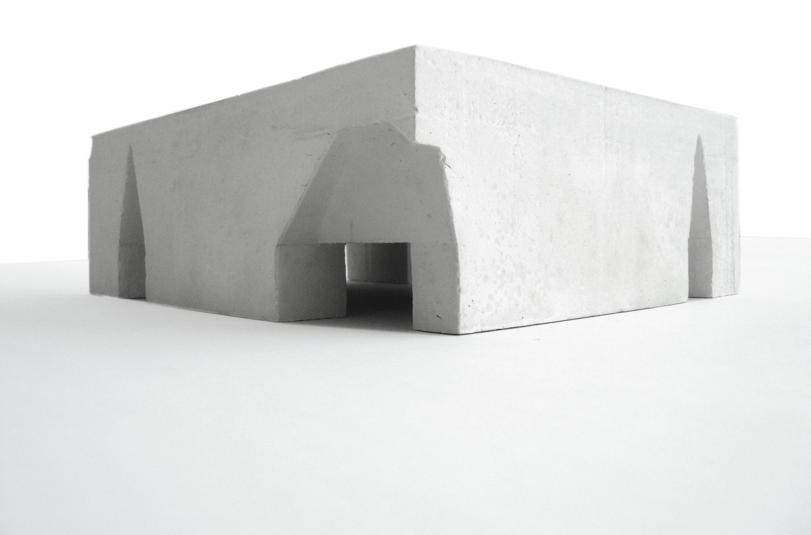 Meeting Centre in Grândola by Aires Mateus. A white sculpted stone ...