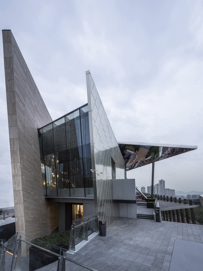 Fragmentation on the cliff. CRCC Chongqing City Park Sales Office by ...