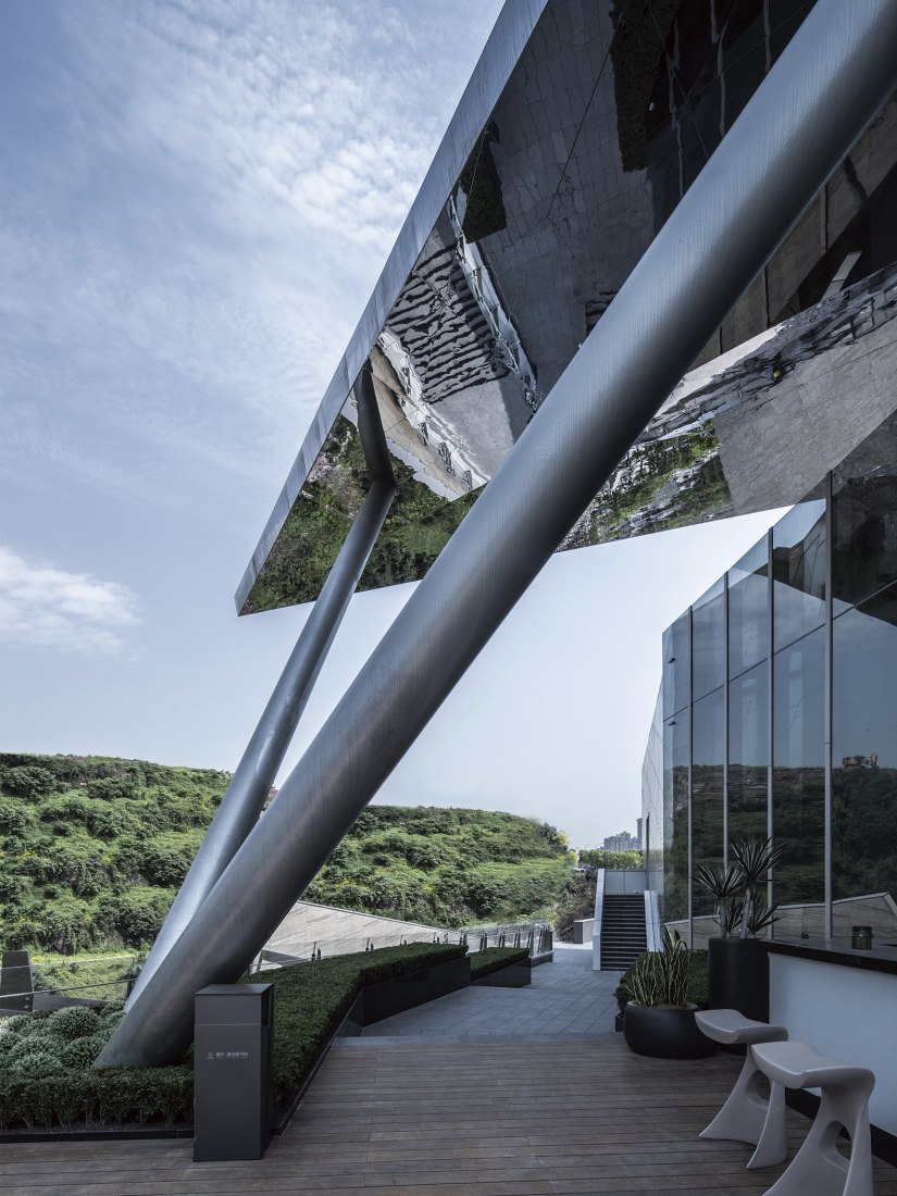 Fragmentation on the cliff. CRCC Chongqing City Park Sales Office by ...