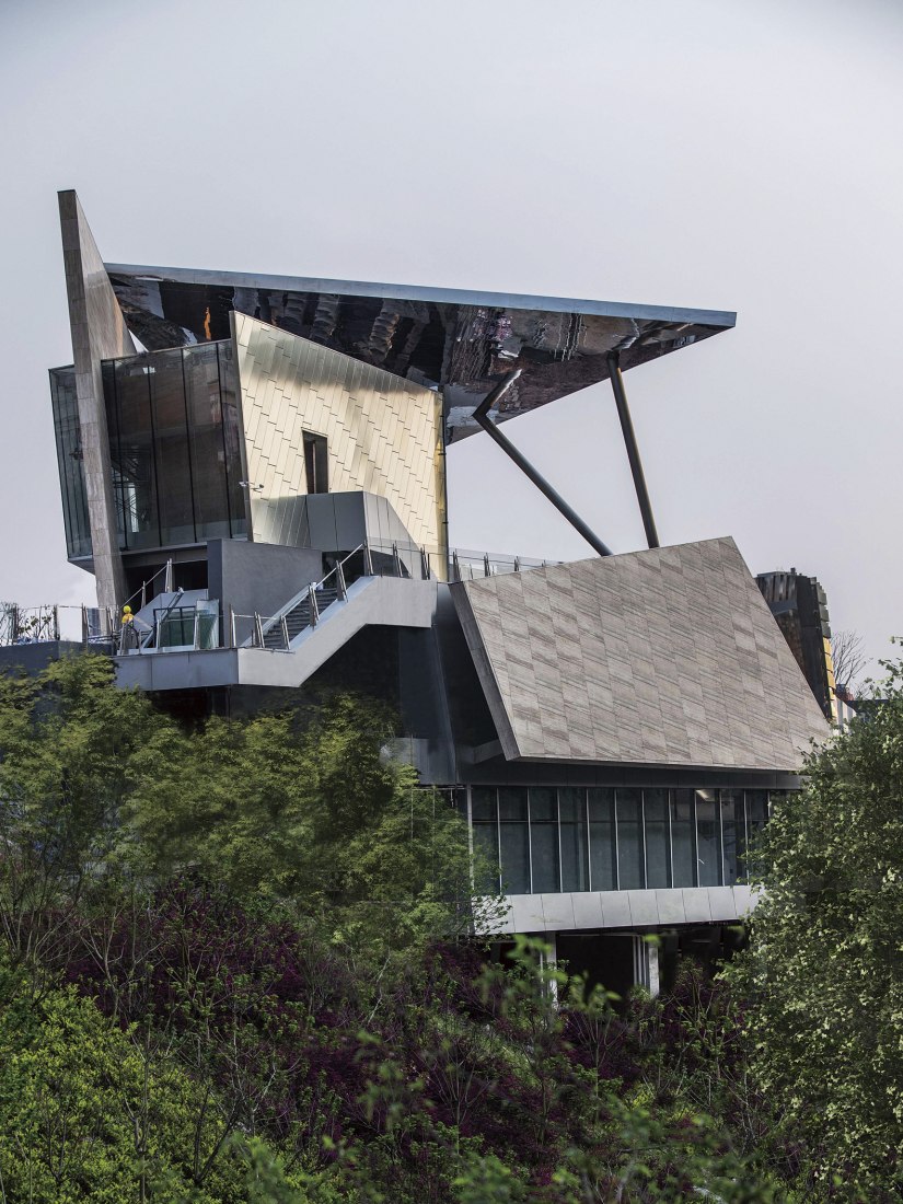 Fragmentation on the cliff. CRCC Chongqing City Park Sales Office by ...