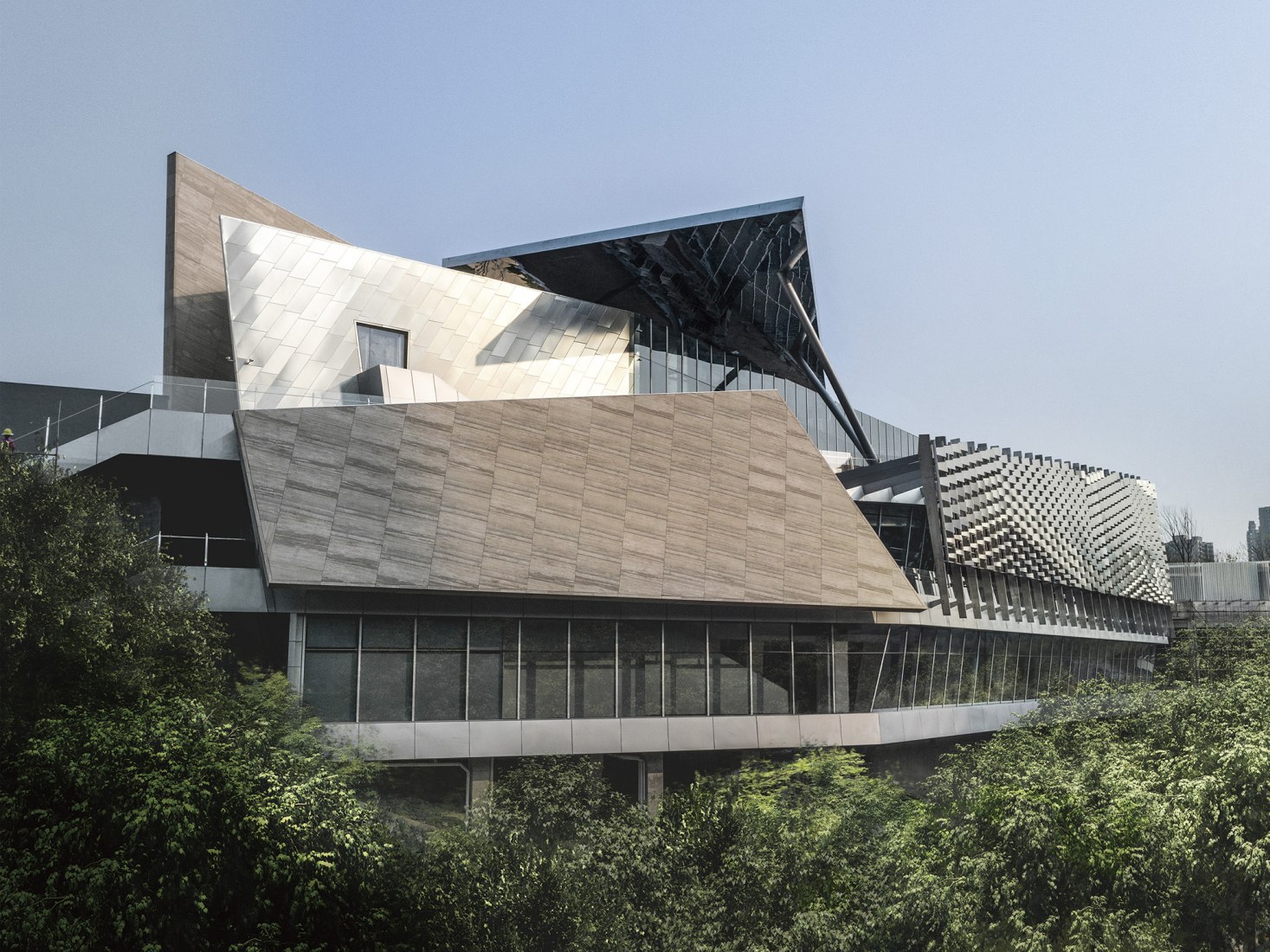 Fragmentation on the cliff. CRCC Chongqing City Park Sales Office by ...