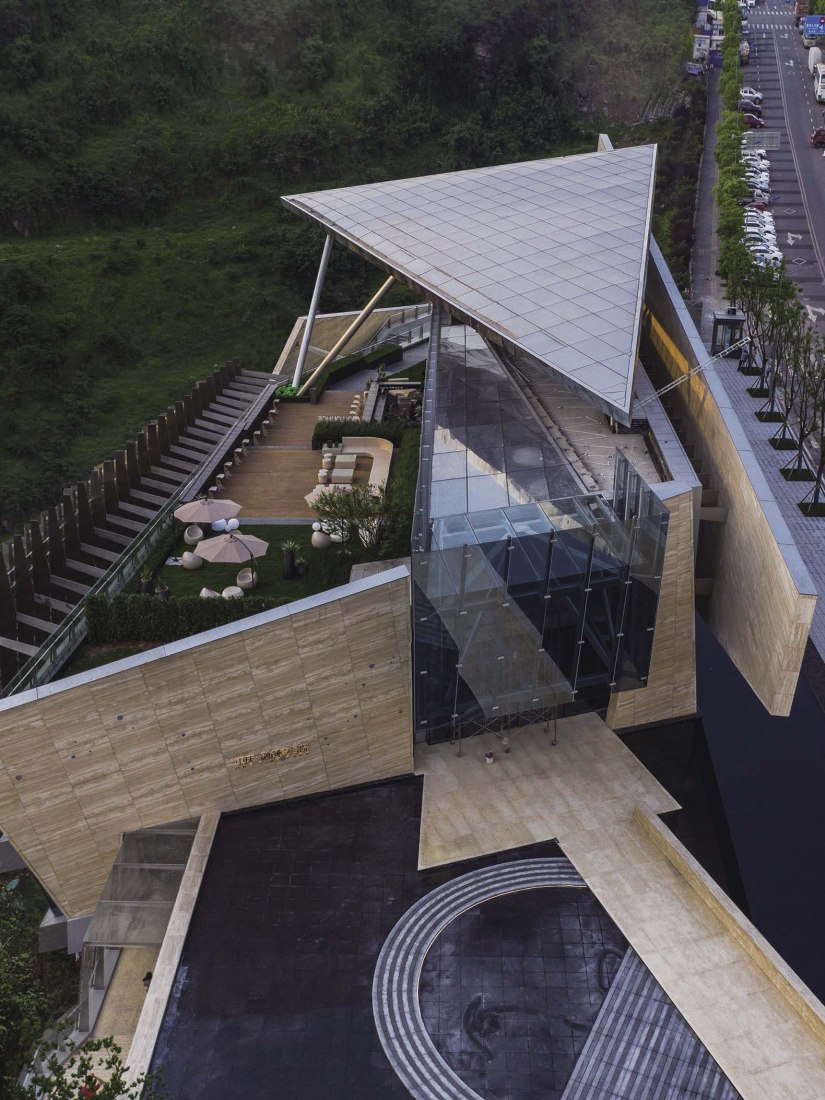 Fragmentation on the cliff. CRCC Chongqing City Park Sales Office by ...