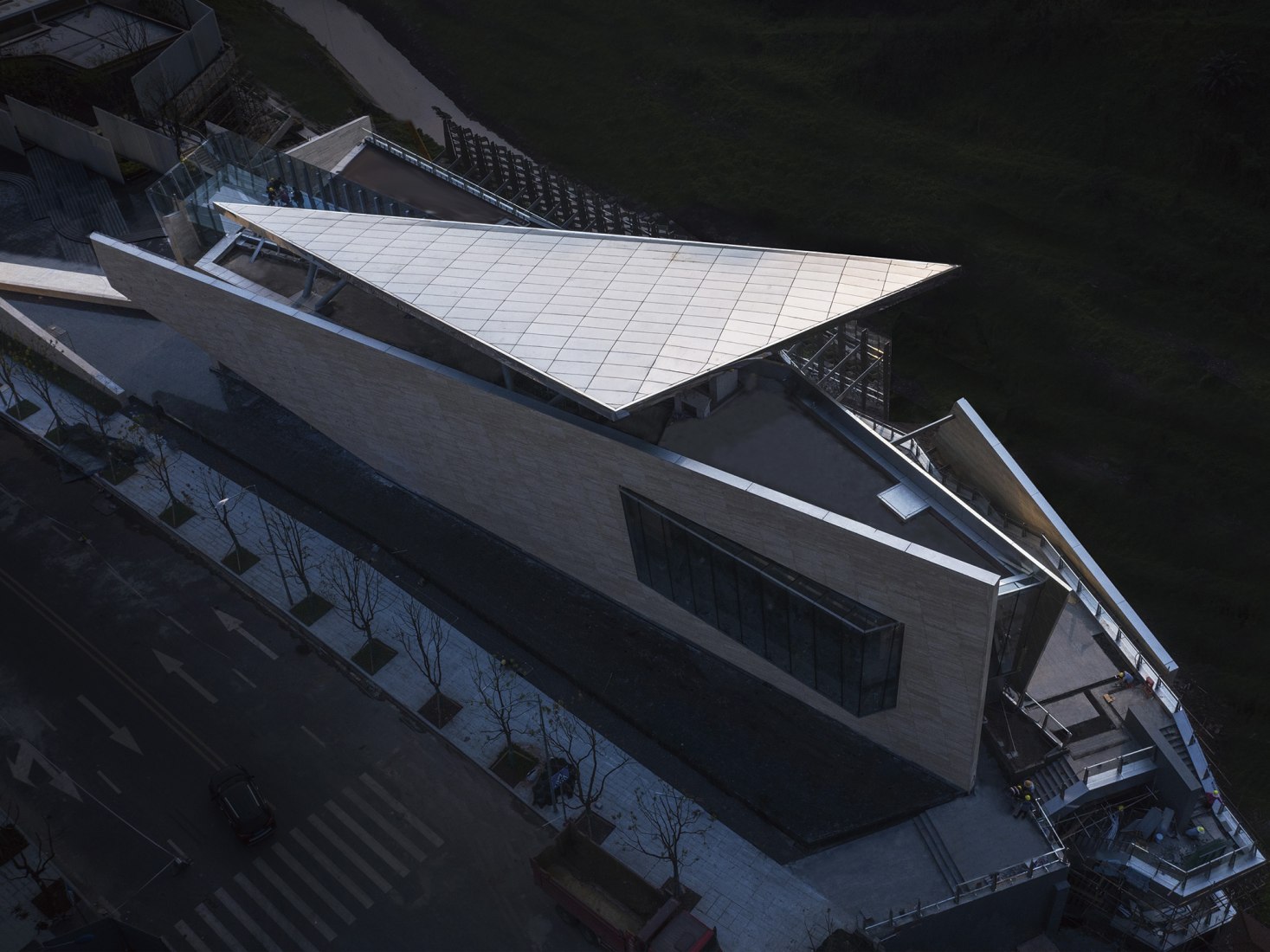 Fragmentation on the cliff. CRCC Chongqing City Park Sales Office by ...