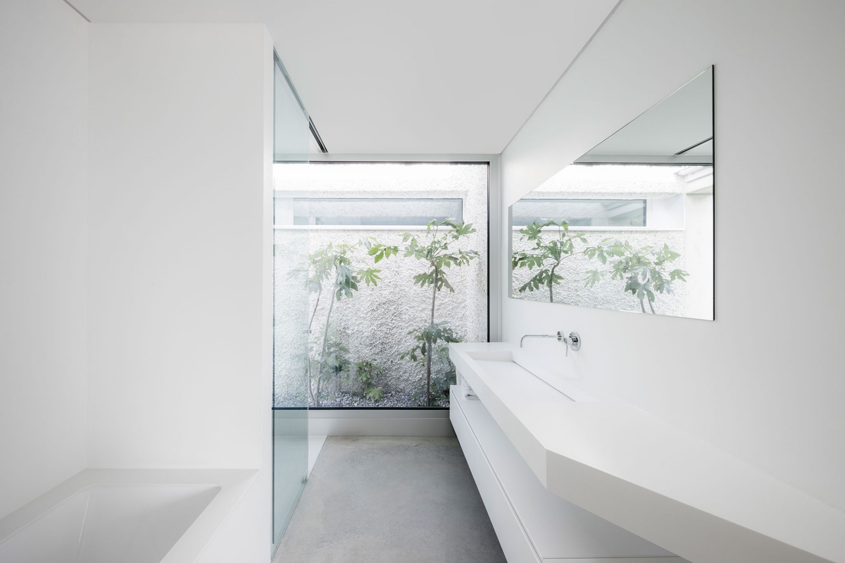 Looking east and west. Concrete house by DF__DC architects | The ...