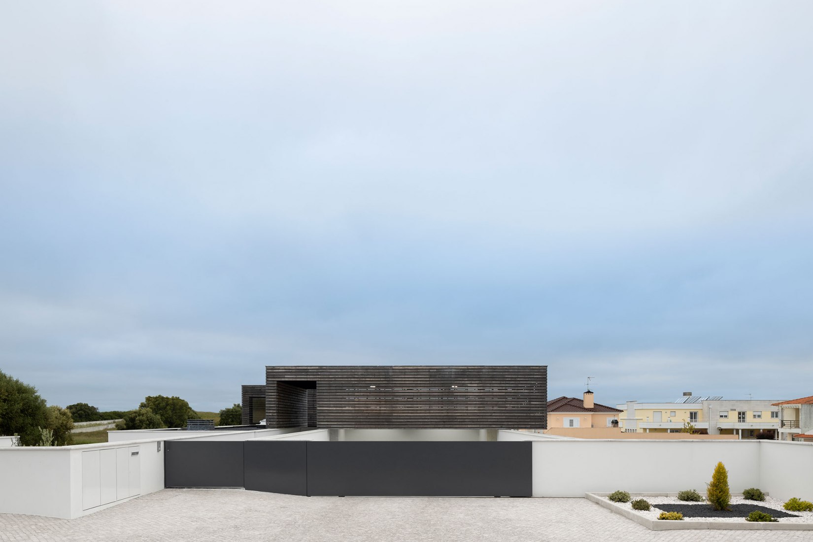 Horizontal bands framing the horizon. TD House by ESQUISSOS | The ...