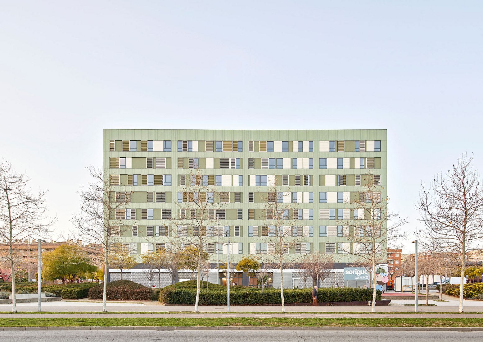 Picturesque Catalan housing. Mixed housing building by Estudio Herreros ...