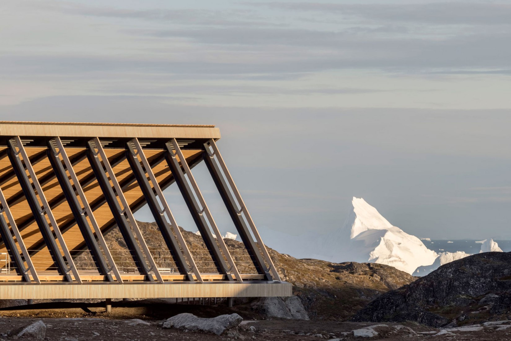 A snowy owl’s flight through the landscape. Ilulissat Icefjord Centre ...