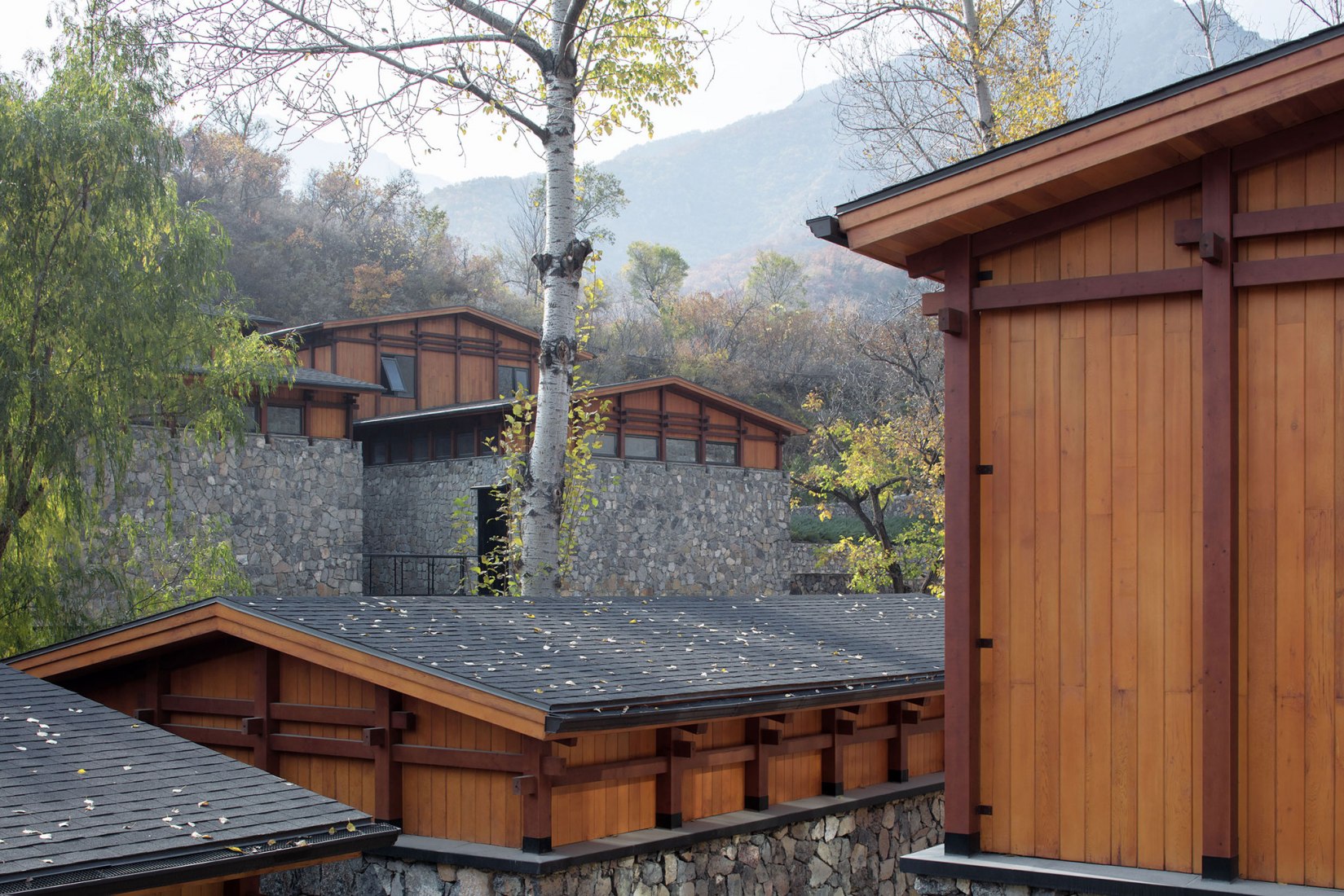 "Naxi" houses on the banks of the river. In S&N Resort by Penda China ...