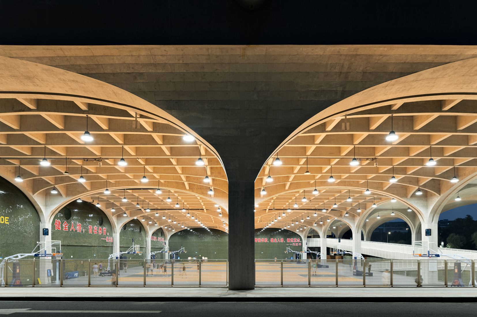 A soccer field as a roof. Indoor Sports Field of Shaoxing University by ...