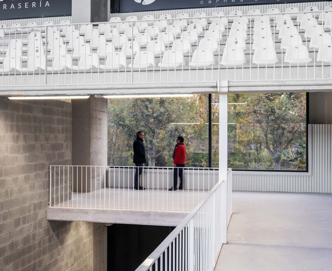 Transition between a natural and urban environment. Soccer stadium "El ...