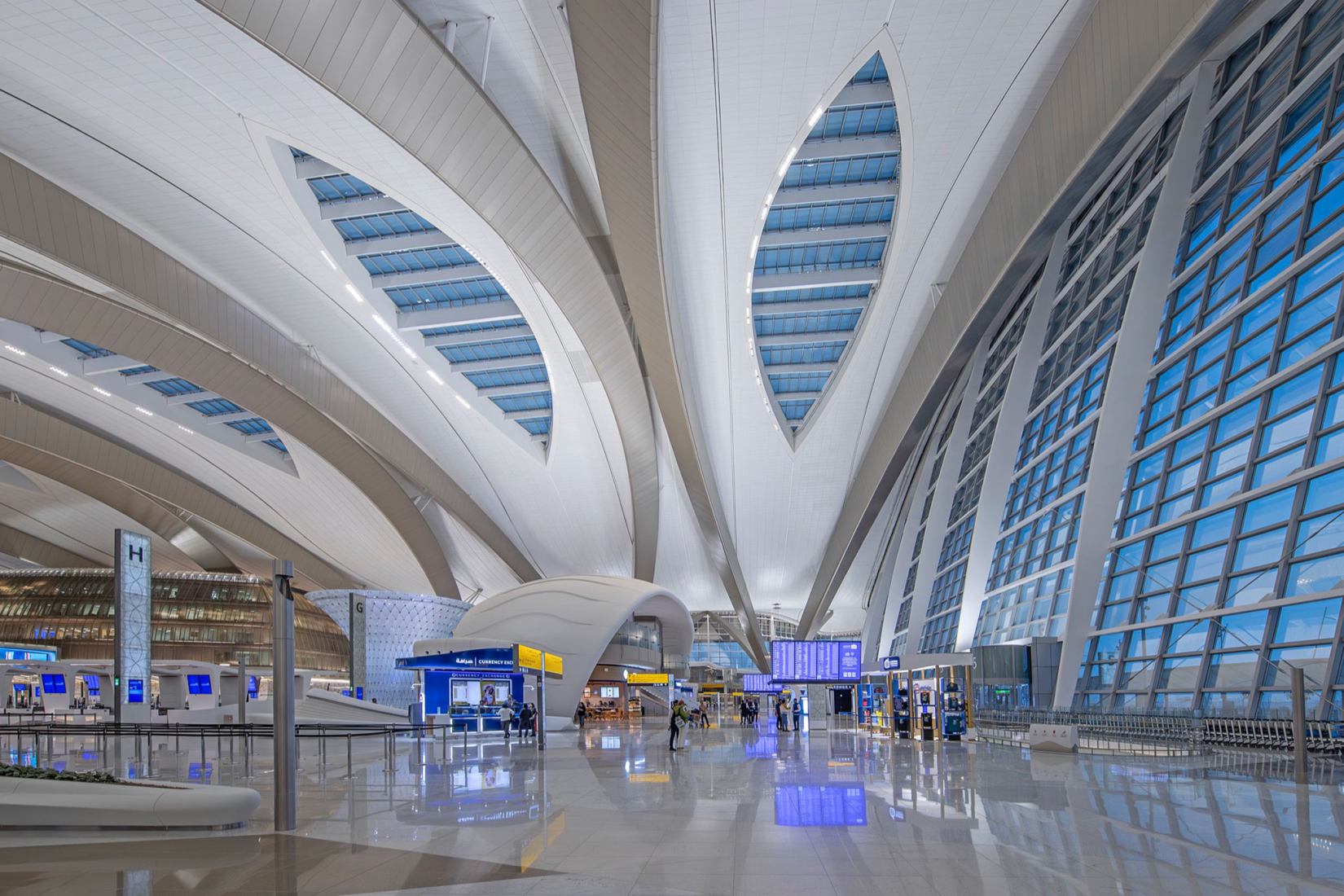 Terminal en forma de X. Aeropuerto Internacional Zayed por KPF | Sobre ...
