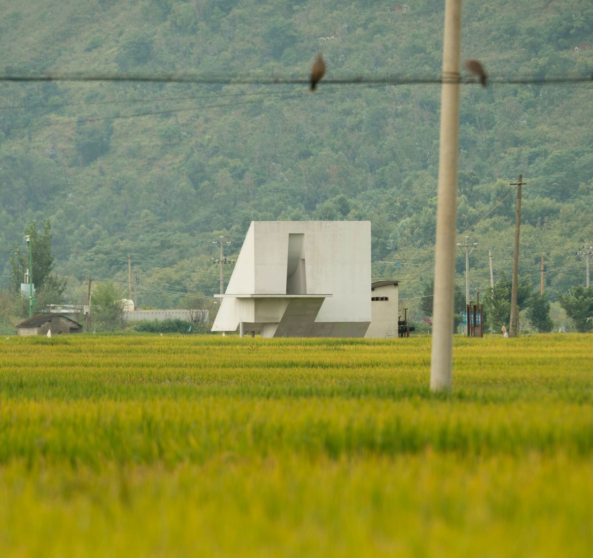 Cultural elements converted into symbols. Concrete Pavilion by LIN ...