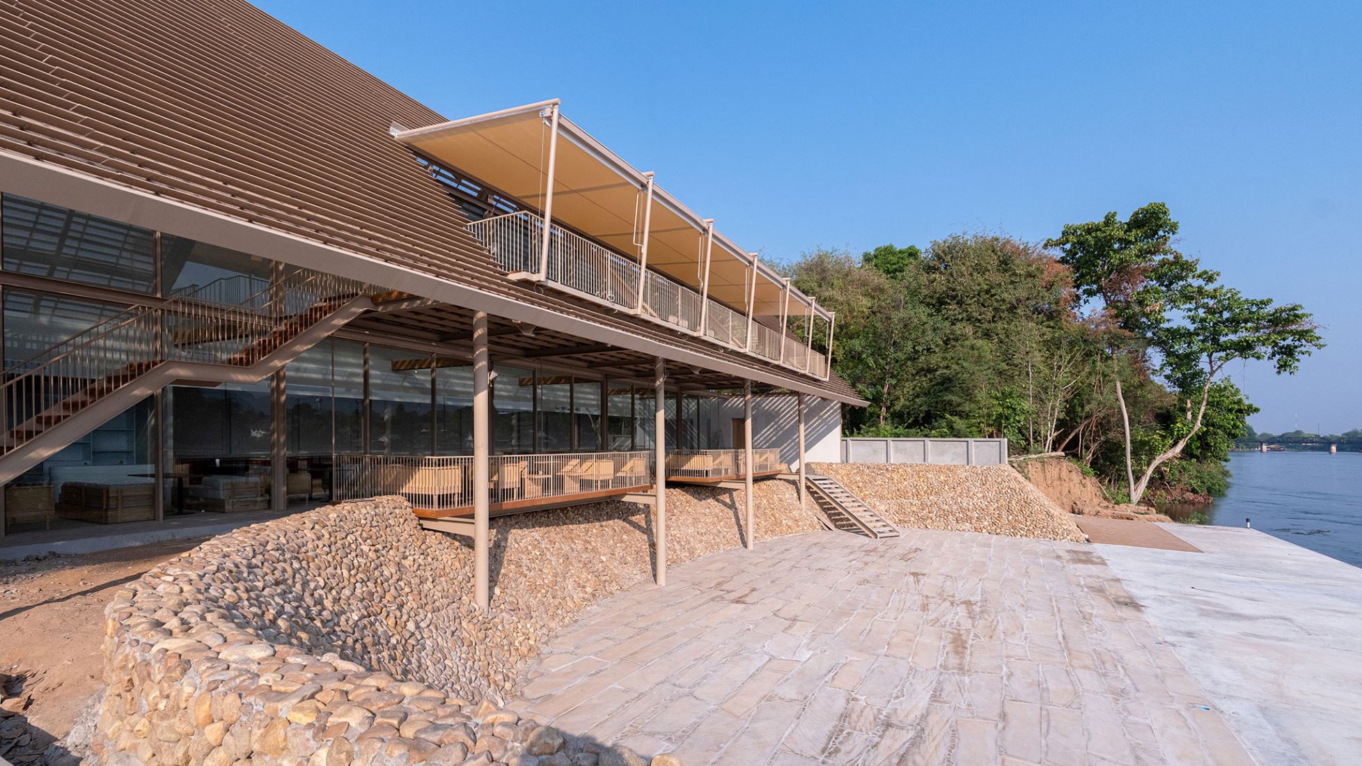Experience on the river bank. Restaurant by the River Kwai by PHTAA ...