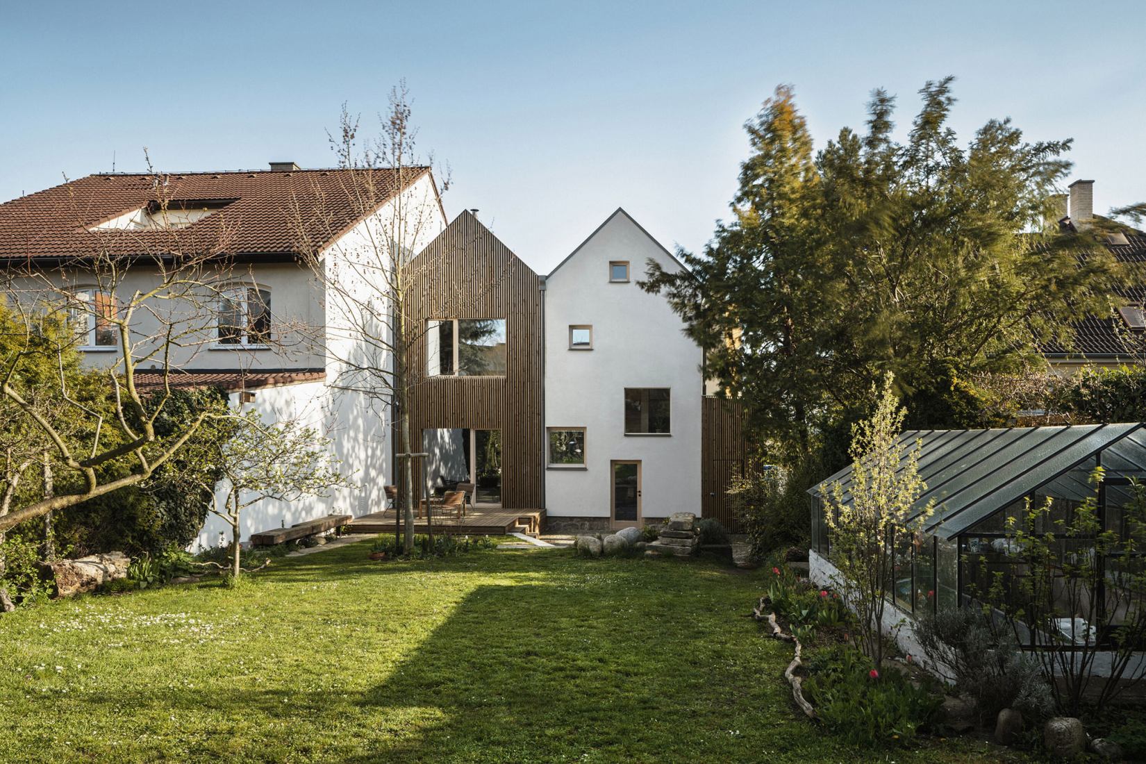 Contemporary extension. Double Gable House by PRO-STORY | The Strength ...