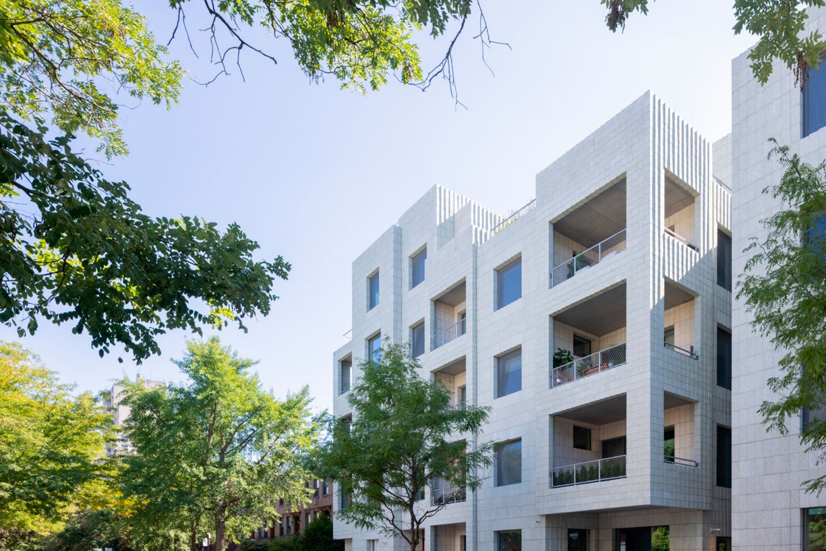 Shared vertical spaces and green areas. 450 Warren by SO- IL | The ...