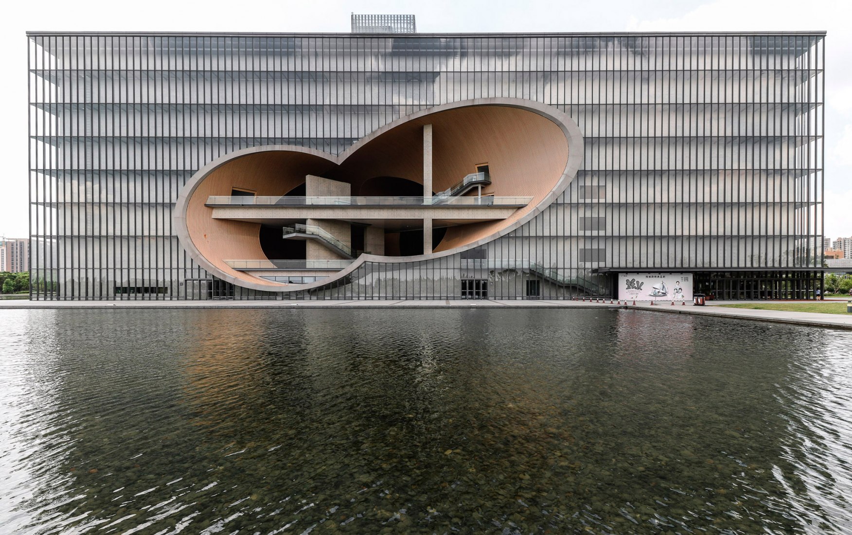 Shanghai Poly Grand Theatre. Tadao Ando's concrete and glass captured ...