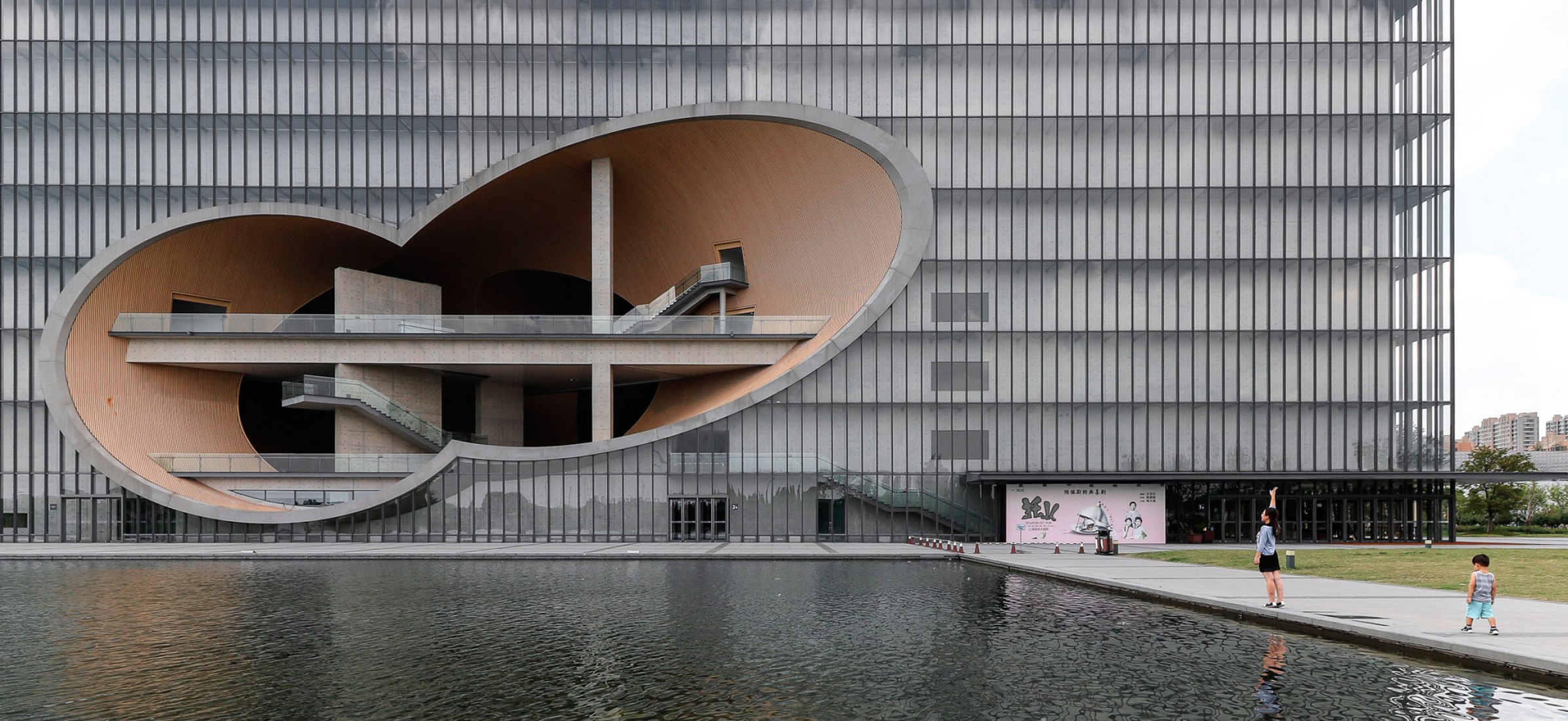 Shanghai Poly Grand Theatre. Tadao Ando's concrete and glass captured ...