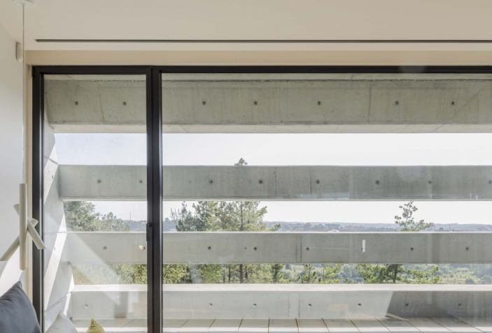 A sculptural envelope of concrete rings. Quinta do Rei by Contaminar ...