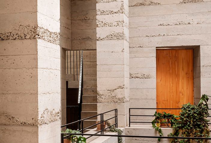 Reconnecting with tradition through an essential central space. House ...