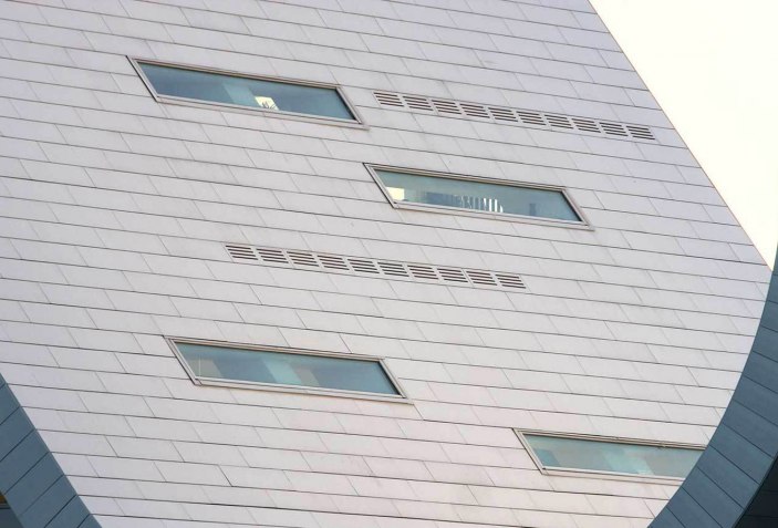 A frozen wave in Denmark. The Wave housing completed by Henning Larsen ...