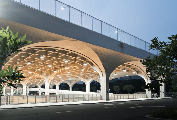 A soccer field as a roof. Indoor Sports Field of Shaoxing University by ...
