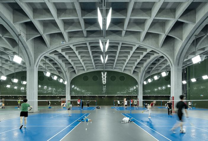 A soccer field as a roof. Indoor Sports Field of Shaoxing University by ...