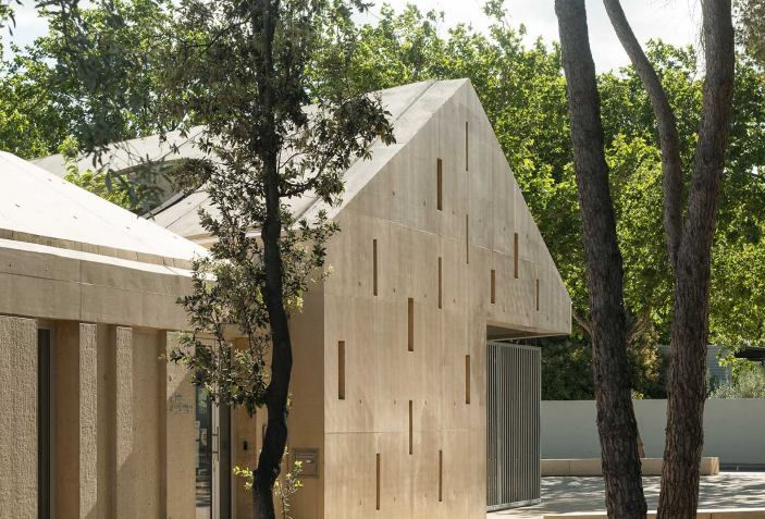 Combination of massiveness and porosity. School group Samuel Paty by ...