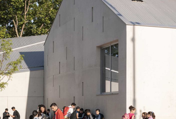 Combination of massiveness and porosity. School group Samuel Paty by ...