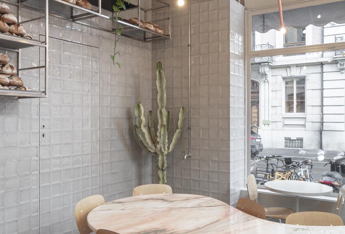 The table as an element of proximity. SAWERDŌ (Bakery & Coffee) by ...