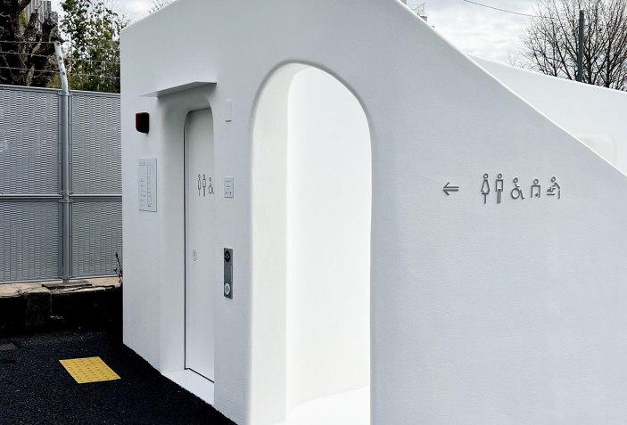 A New Way Of Public Space Where People Gather Around Water Toilet By