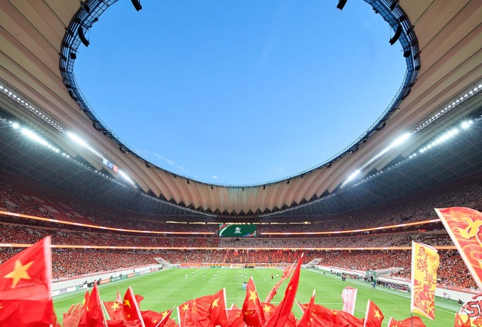 Inaugural match at Xian International Football Centre by Zaha Hadid ...